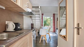 Apartamento, 1 quarto (Mezzanine) | 1 quarto, quartos insonorizados, berços/camas para crianças