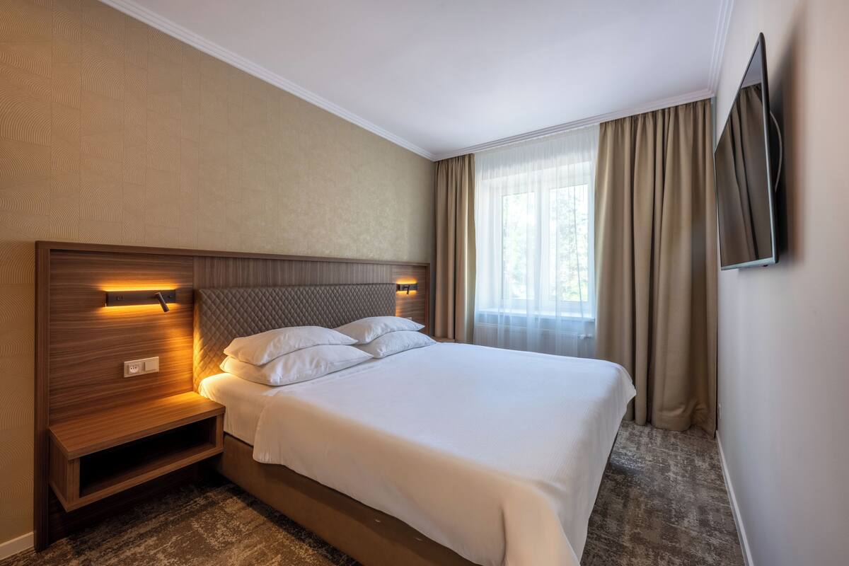 Apartamento, 1 quarto, cozinha | Roupa de alta qualidade, minibar, cofre no quarto, secretária 