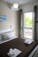 Quarto casal | Escrivaninha, Wi-Fi de cortesia, roupa de cama