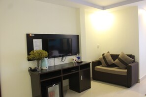 Quarto Familiar | Sala de estar | TV de ecrã plano 