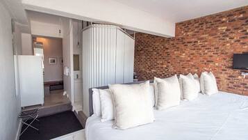 Apartamento standard | Roupas de cama premium, cofres nos quartos, individualmente mobiliados