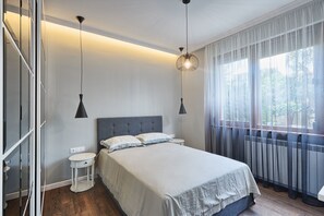 Apartamento Cidade, 2 quartos, Vista para a cidade | 2 quartos, quartos insonorizados, berços/camas para crianças