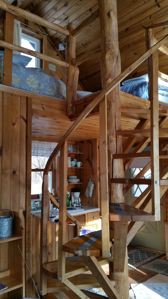 Spiral Staircase Leads To The Lofted Bedroom With Wall To Wall Knotty Pine. - Minnesota