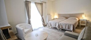 Apartamento, no piso térreo | Quartos à prova de som, ferros/tábuas de passar roupa, Wi-Fi de cortesia