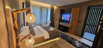 Estúdio luxo, vista para o jardim | Roupas de cama premium, frigobar, cortinas blackout