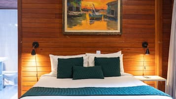 Chalé, várias camas | 1 quarto, minibar, cortinas/cortinados opacos, roupa de cama fornecida