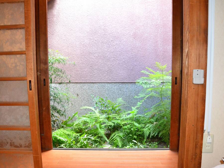 Quarto Quádruplo Clássico, 1 quarto, vista para o jardim | Vista do quarto