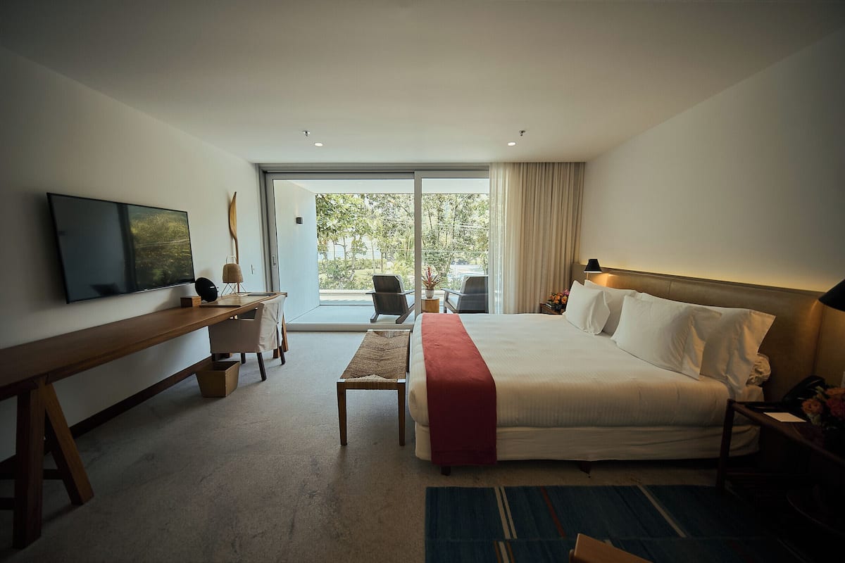 Quarto superior, vista para o jardim | Cofres nos quartos, Wi-Fi de cortesia, roupa de cama