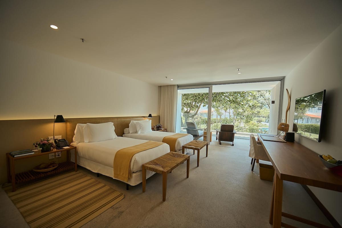 Cofres nos quartos, Wi-Fi de cortesia, roupa de cama