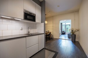 Apartamento conforto | Roupas de cama antialérgicas, cofres nos quartos, escrivaninha