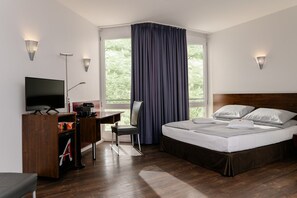 Quarto Duplo Comfort | Minibar, secretária, ferro/tábua de engomar, Wi-fi grátis 