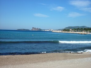 Na praia, windsurf, pesca 