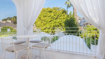 Suite, 1 quarto, varanda | Terraço/pátio interior