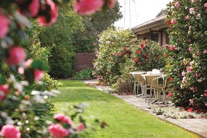 Suite, vista para o jardim | Vista do quarto