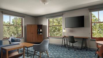Quarto moderno com uma grande janela, televisão de tela plana, armário de madeira e tapete azul estampado.