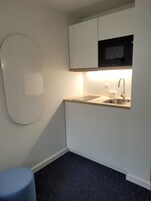 Apartamento família | Cozinha privada | Geladeira, micro-ondas, chaleira elétrica