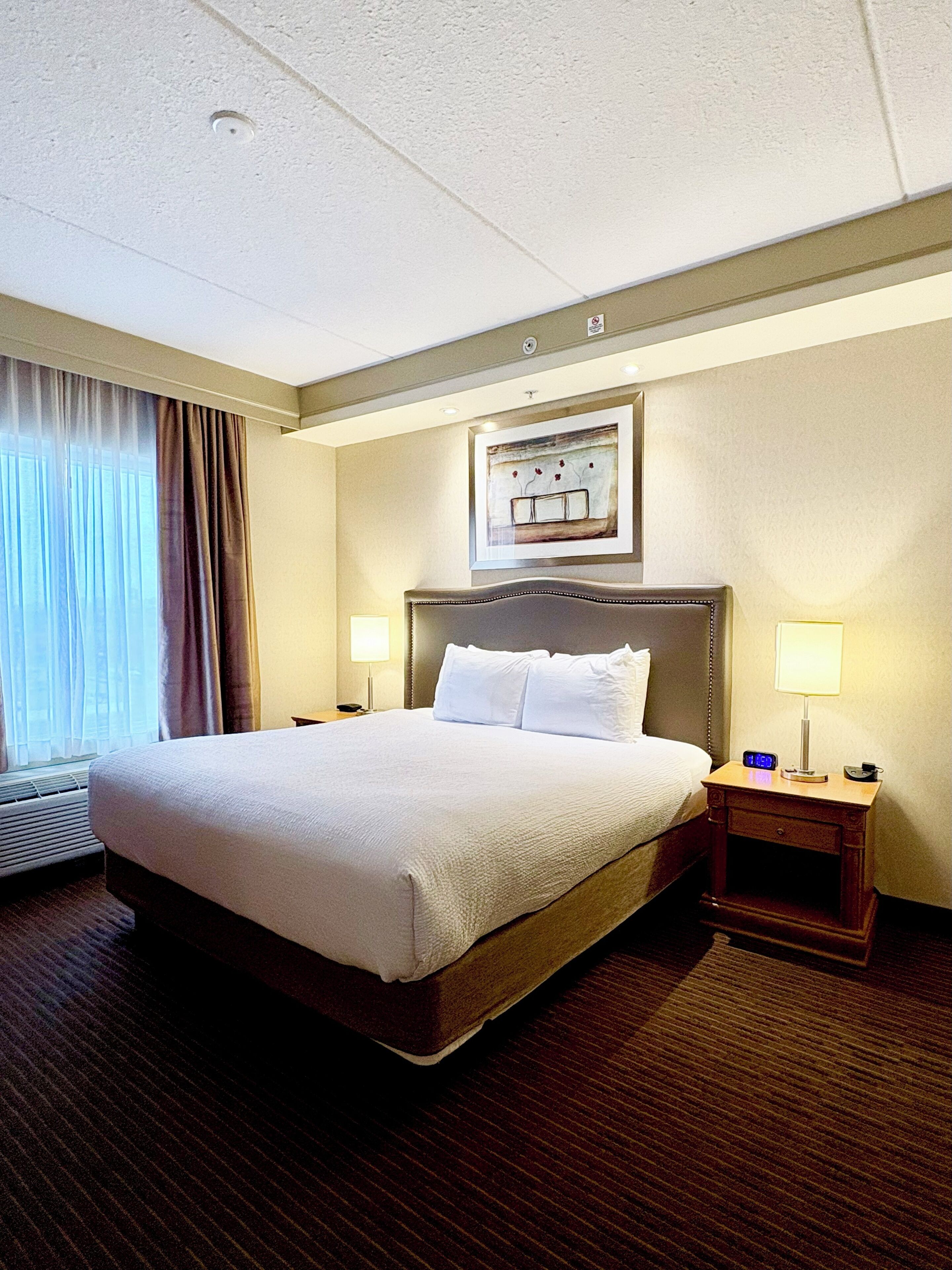 Suíte empresarial, 1 cama King e sofá-cama, para não fumantes | Roupas de cama premium, edredons de pluma, camas com colchões pillow-top