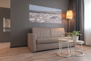 Quarto superior | Área de estar | TV