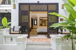 Quarto Deluxe, vista para o jardim | Vista do quarto