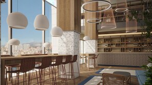 2 bares/lounges, um bar junto à piscina 