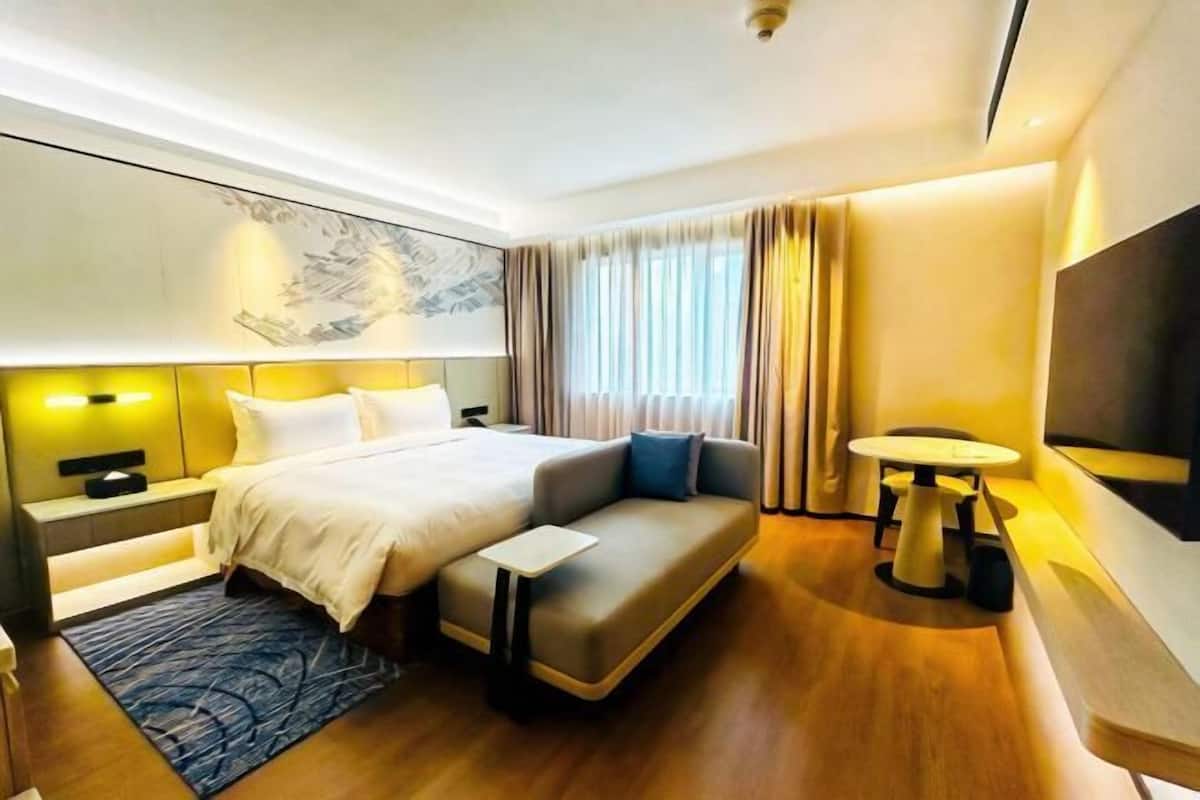 Roupas de cama premium, edredons de pluma, frigobar, cofres nos quartos