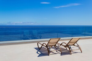 Quarto duplo, vista para o mar | Terraço/pátio