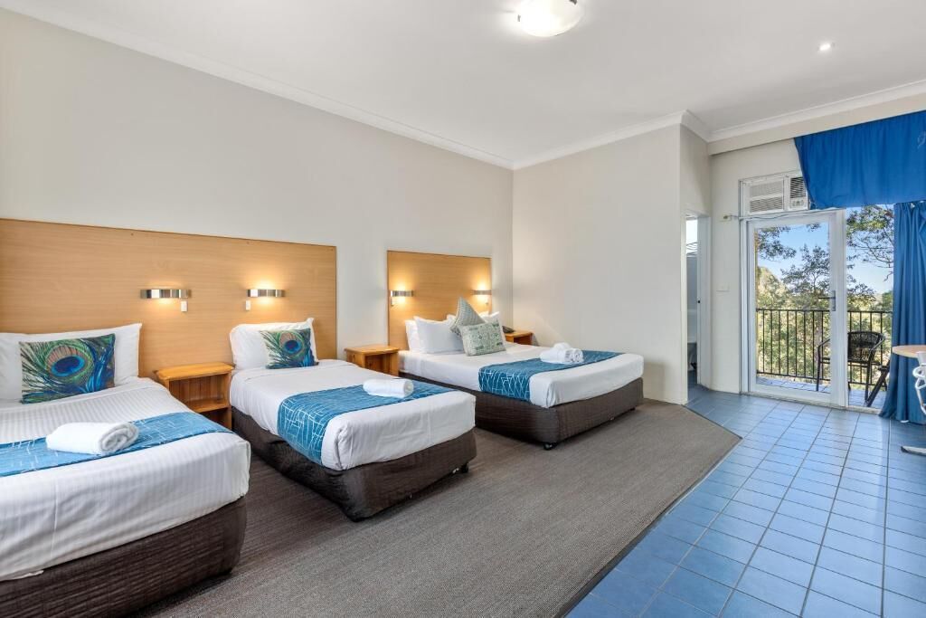 Quarto Deluxe, vista para o jardim (Superior Family Rooms) | Cortinas/cortinados opacos, quartos insonorizados 