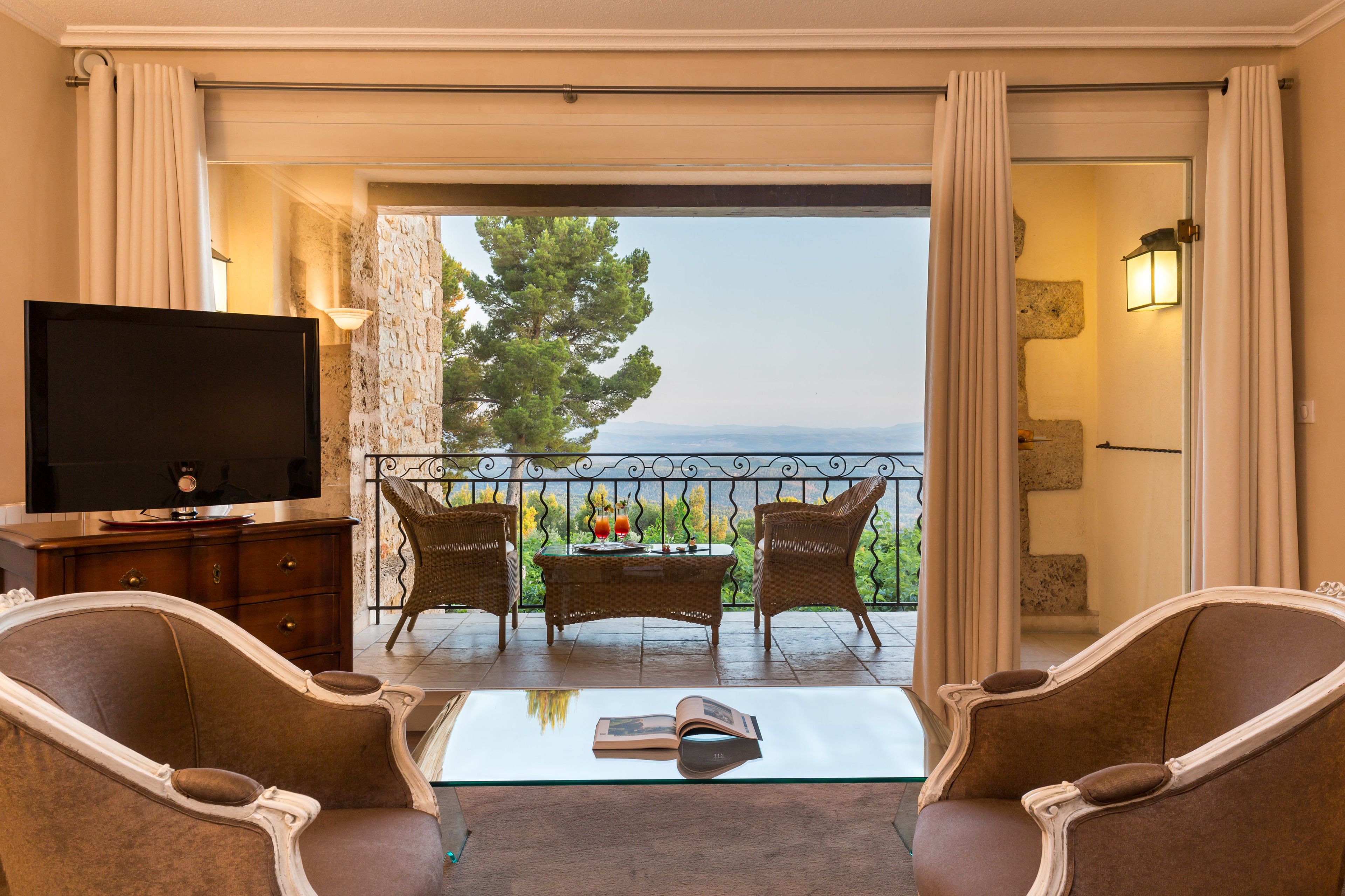 Quarto (Spa access included) | Área de estar | TV de tela plana