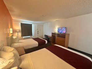 Minibar, cofre no quarto, secretária, ferro/tábua de engomar 