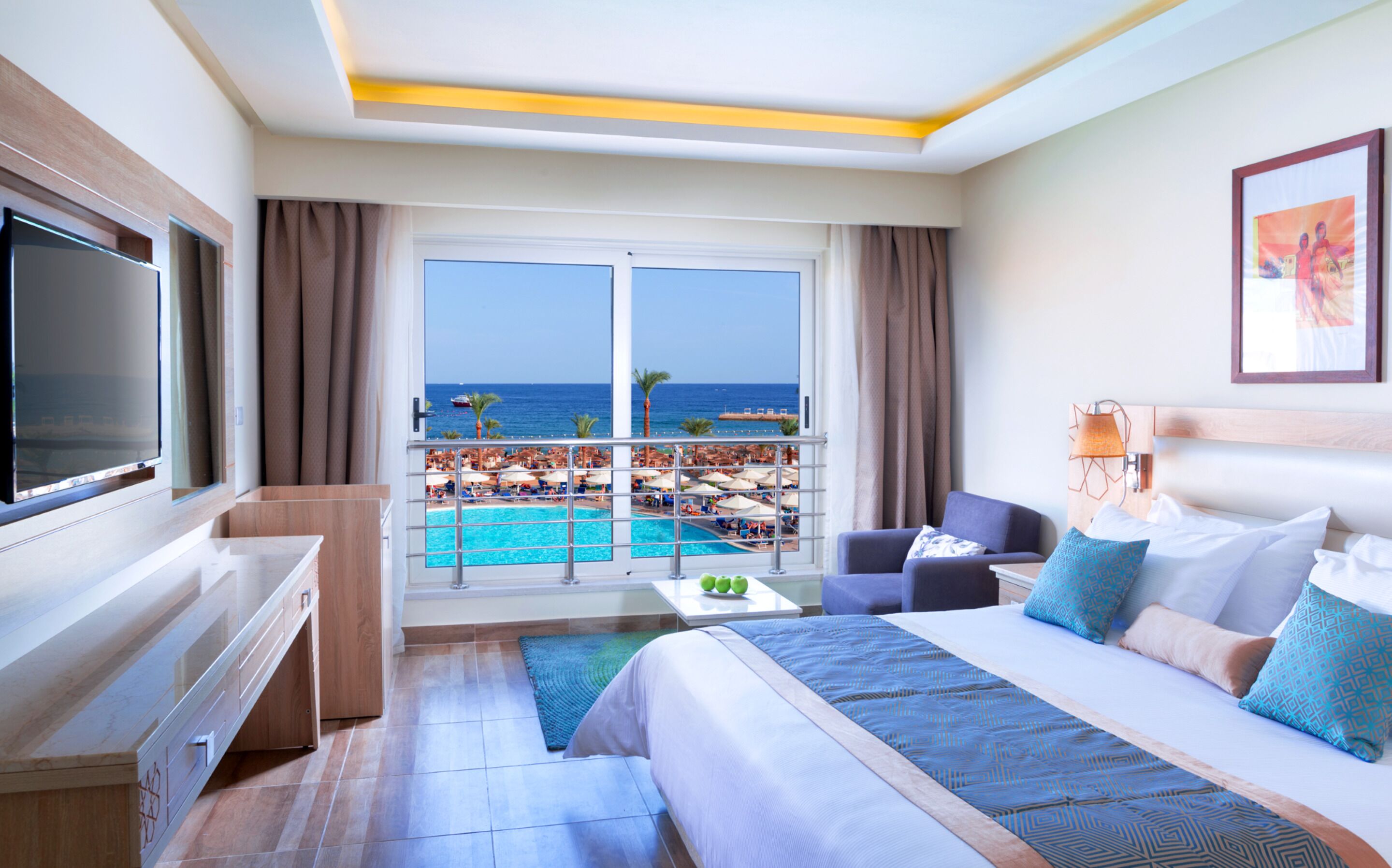 Suíte, vista para o mar | Frigobar, cofres nos quartos, escrivaninha, roupa de cama