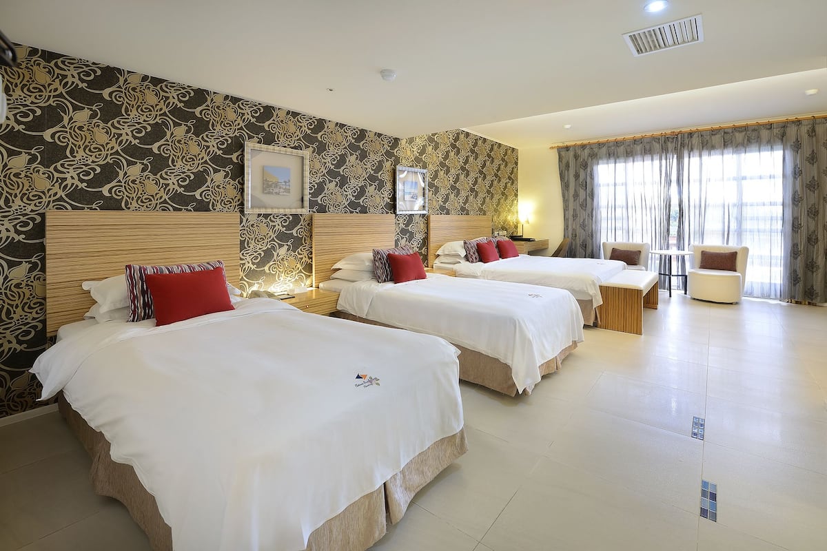 Quarto Familiar, vista para o oceano (Family room ocean view 1F) | Roupa de alta qualidade, camas de colchão Tempur-Pedic, minibar 