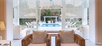 Villa, 3 quartos, piscina privativa, vista para o jardim (Indigo) | Sala de estar | TV de ecrã plano 