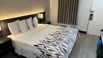 Escrivaninha, cortinas blackout, Wi-Fi de cortesia, roupa de cama