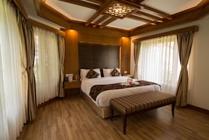 Suite Júnior, 1 quarto | Cofre no quarto, com mobília individualizada, secretária, Wi-fi grátis 