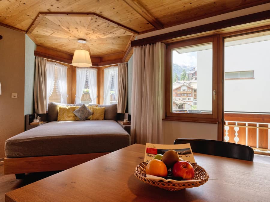 Suite Júnior, varanda | Camas de colchão pillowtop, minibar, cofre no quarto, secretária