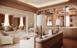 Um hall de hotel luxuoso com área de estar central, um bar e uma vitrine de joias.