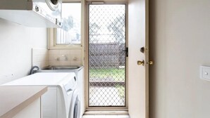 Apartamento, 3 quartos, terraço | Lavanderia