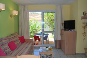 Apartamento Superior (Barbades) | Sala de estar | Televisor, ténis de mesa 