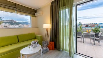 Suite, 1 quarto, terraço, Vista para a cidade | Camas de colchão pillowtop, minibar, cofre com capacidade para portátil