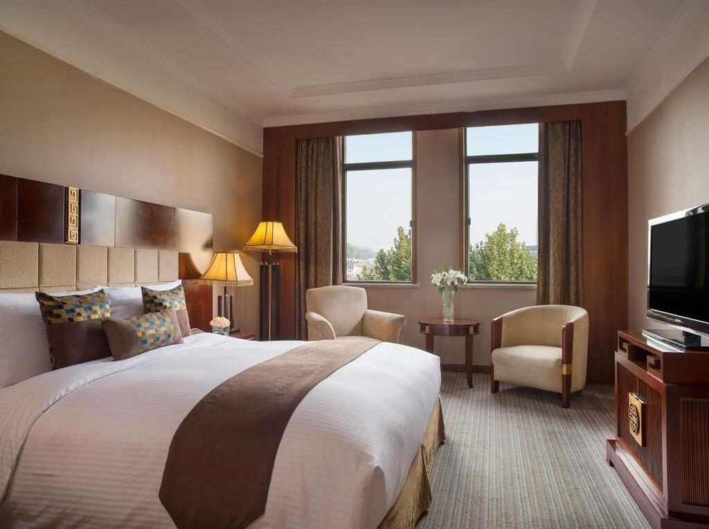 Suite Deluxe, 1 cama king-size | Minibar, cofre no quarto, secretária, cortinas/cortinados opacos 
