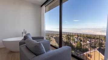 Suite Júnior, 1 quarto, Vista para a cidade | Sala | Televisor