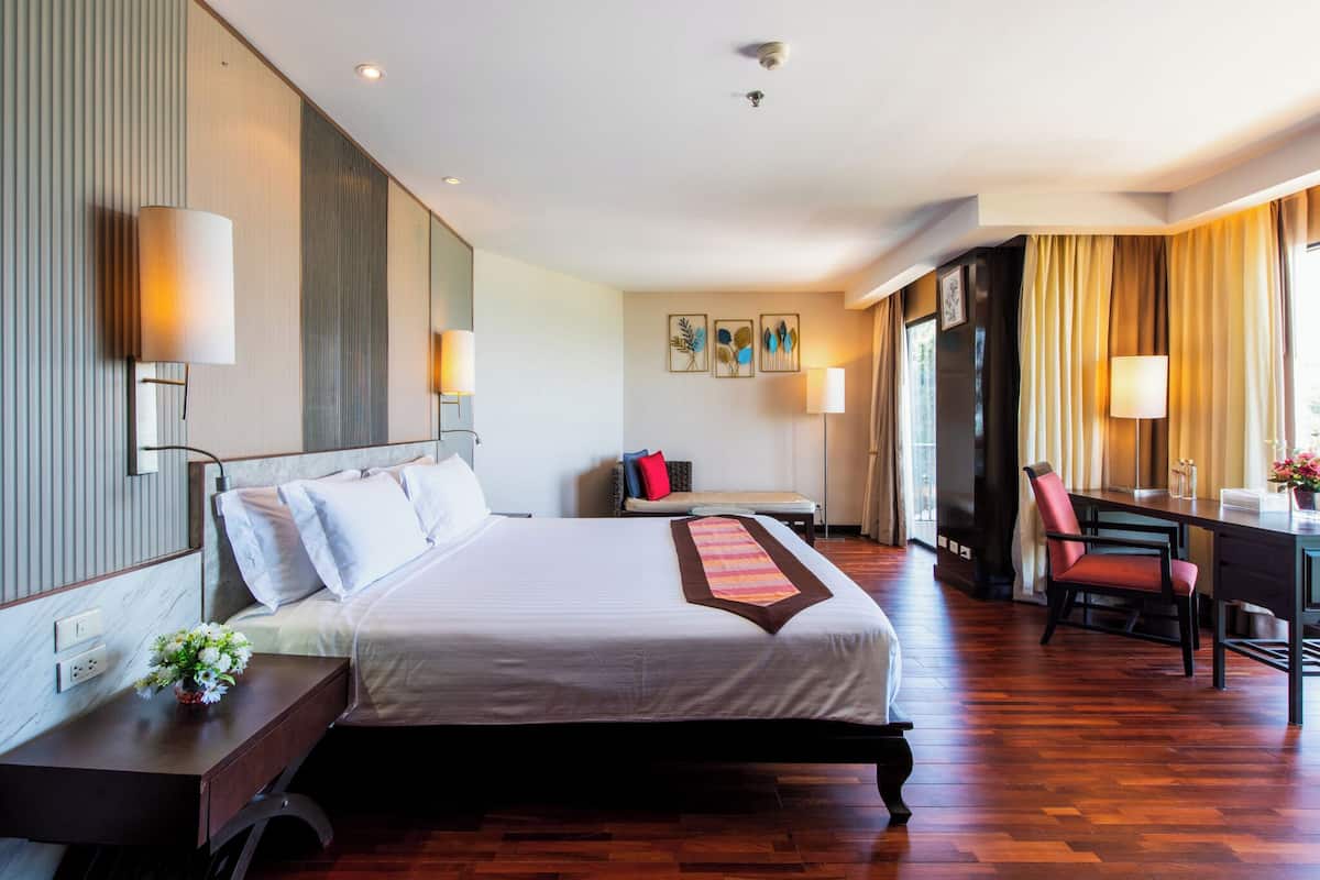 Suíte júnior | Frigobar, cofres nos quartos, individualmente mobiliados, escrivaninha