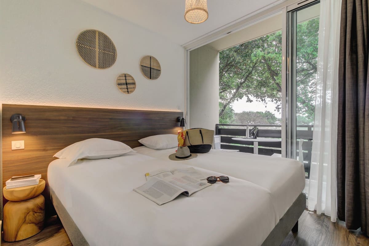 2 quartos, cofre no quarto, Wi-fi grátis, roupa de cama fornecida