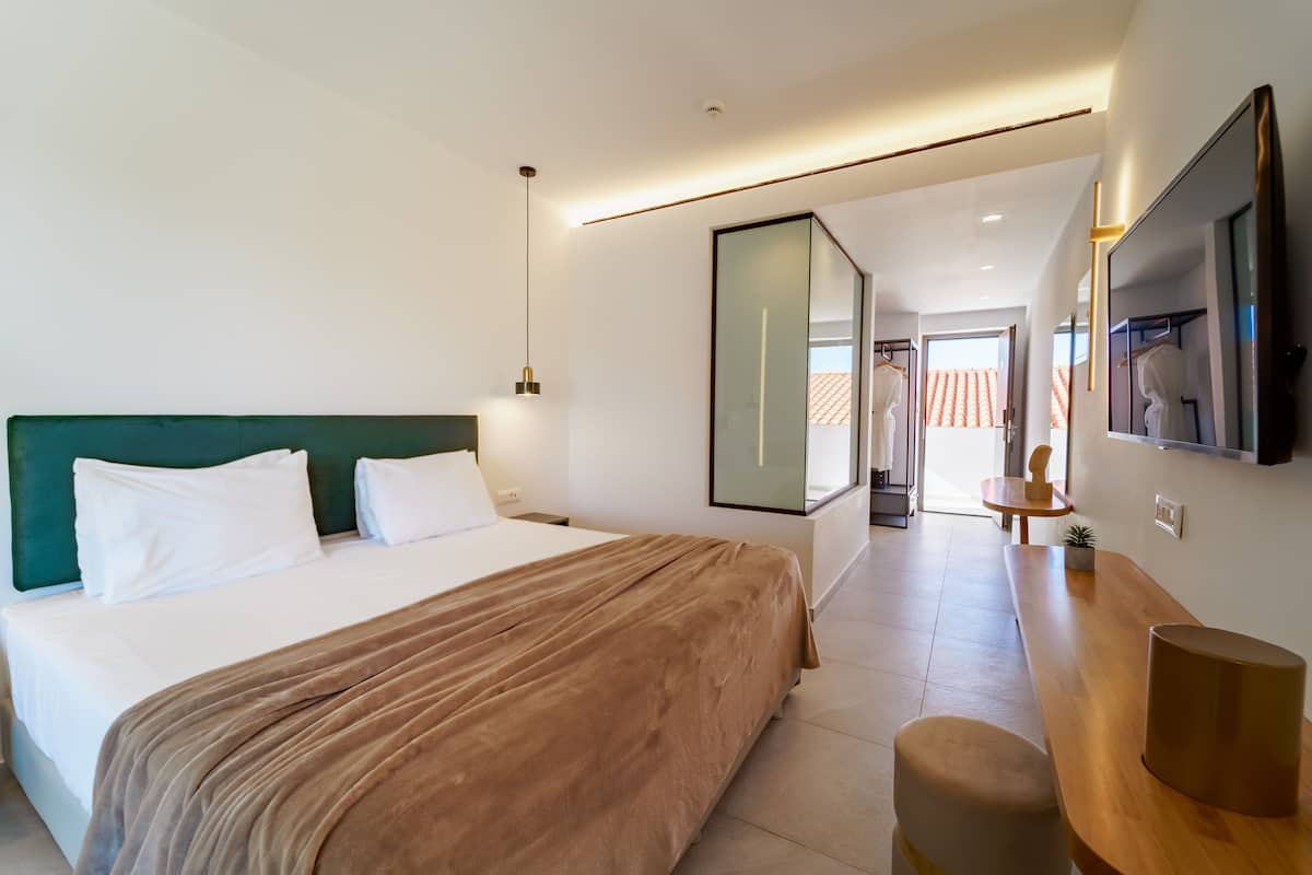 Suite Júnior | Roupa de alta qualidade, camas de colchão pillowtop, minibar 