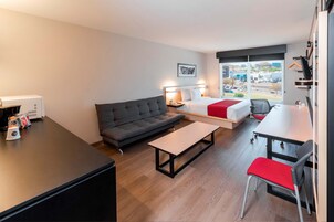 Quarto Superior, 1 cama queen-size e sofá-cama | Secretária, ferro/tábua de engomar, Wi-fi grátis