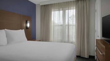 Suite, 1 quarto | Roupa de alta qualidade, cofre no quarto, secretária
