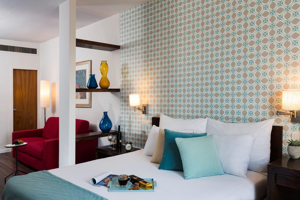 Suite Júnior, Vista para a cidade | Cofre no quarto, secretária, Wi-fi grátis, roupa de cama fornecida
