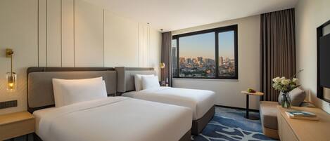 Roupas de cama premium, edredons de pluma, frigobar, cofres nos quartos