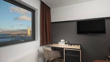 Cortinas blackout, Wi-Fi de cortesia, roupa de cama