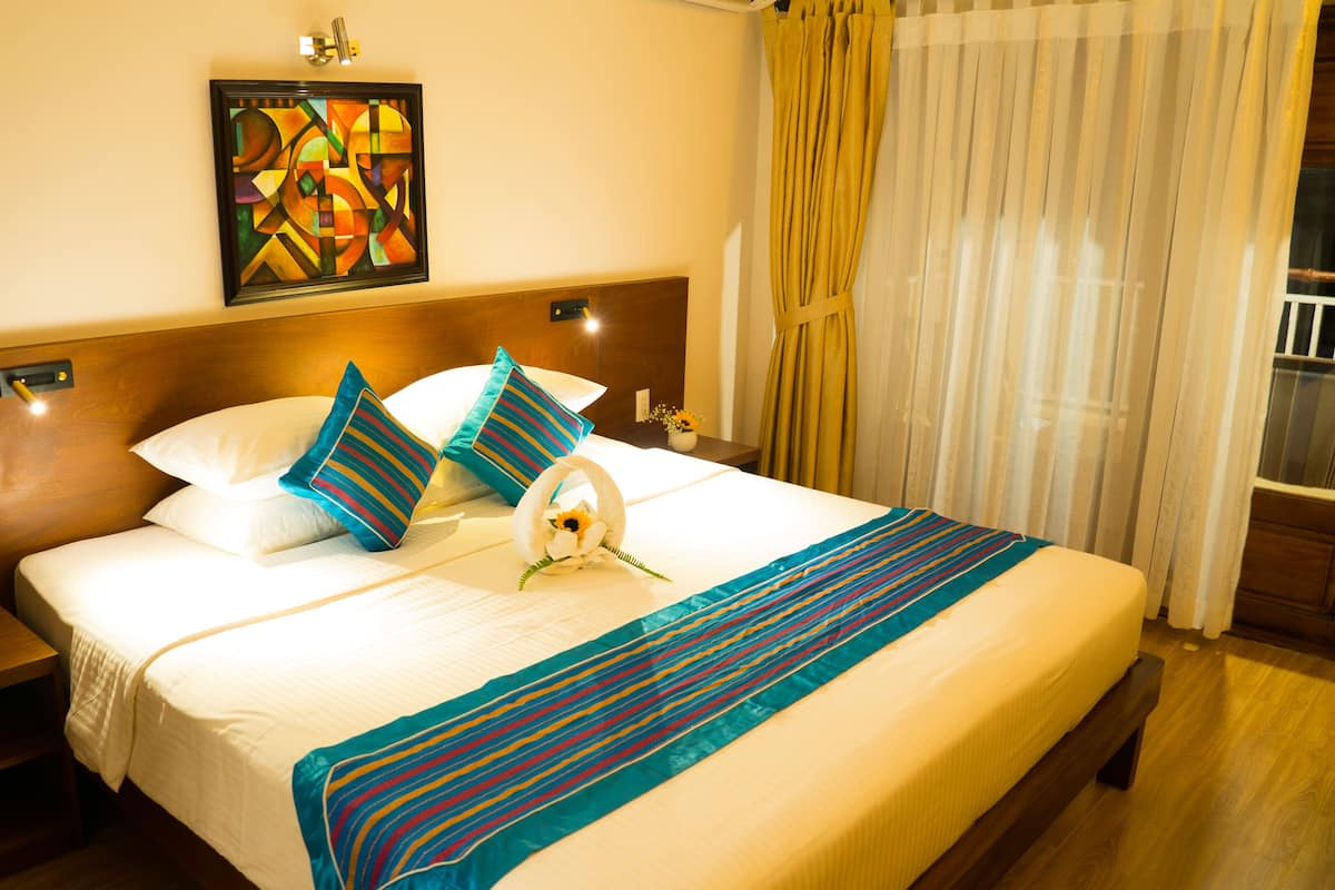 Quarto Superior | Minibar, cofre no quarto, ferro/tábua de engomar, Wi-fi grátis 